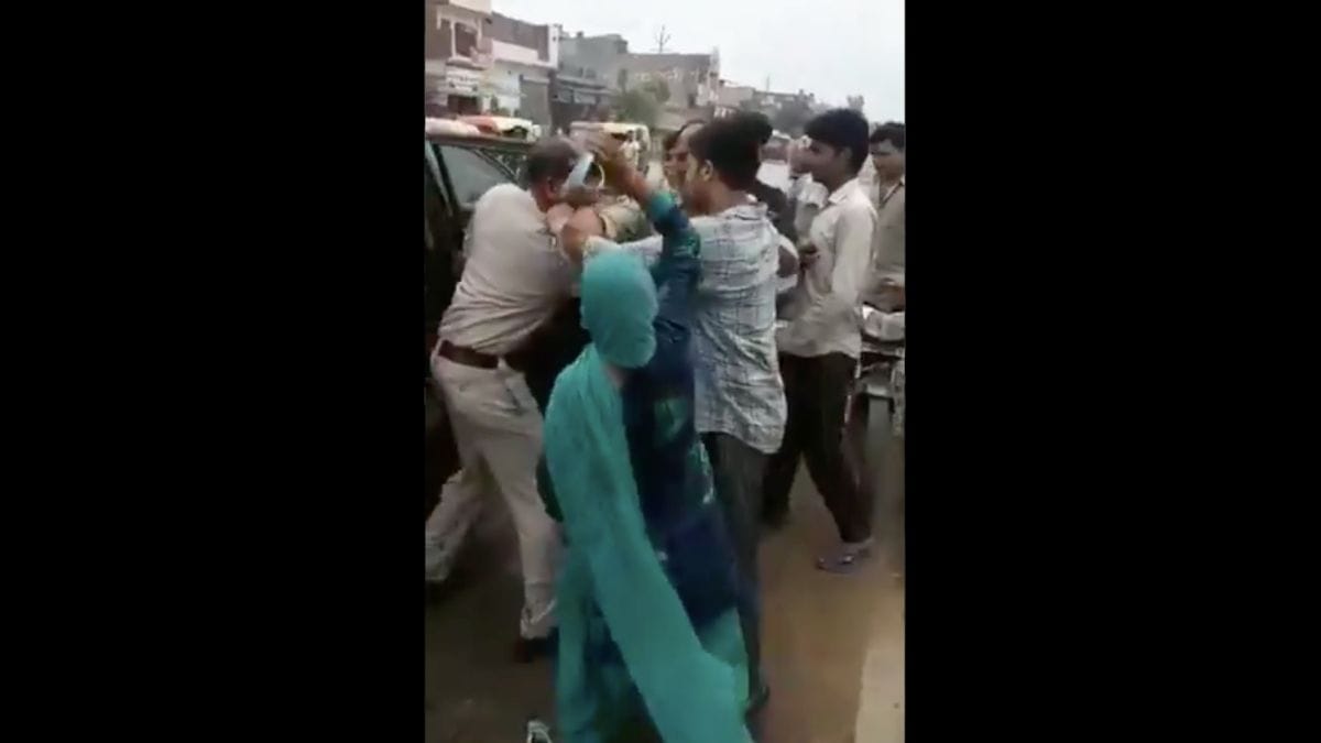 Viral video of Muslim man and woman beating police officer with ...