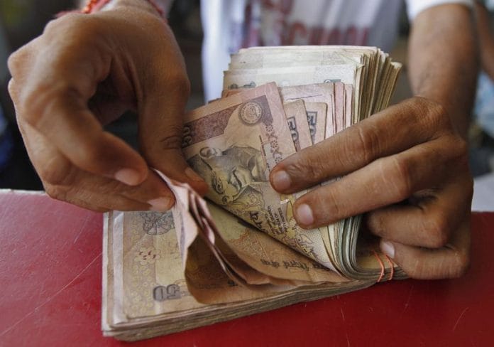 Rupee hits record low amid worries about US tariffs; RBI likely steps ...