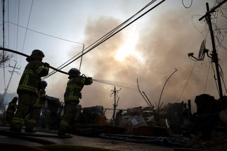 Hundreds of firefighters tackle blaze in deprived area of South Korea's ...
