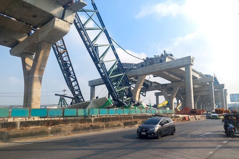 Two dead in Thailand after another crane collapses, crushing cars ...