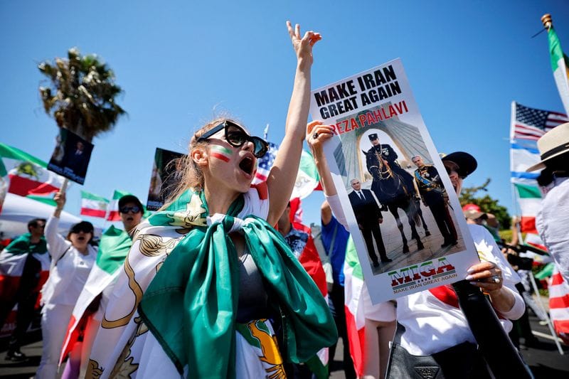 Some Iranian Americans wave protest flags, others cheer as Iran play ...